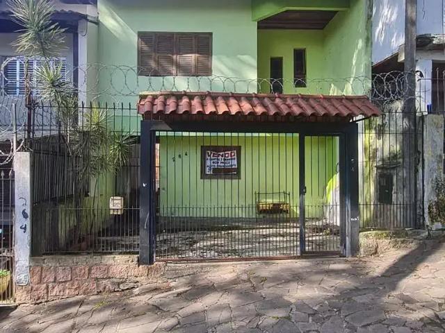 Casa / Sobrado para Venda em Porto Alegre/RS Partenon 4 Quartos