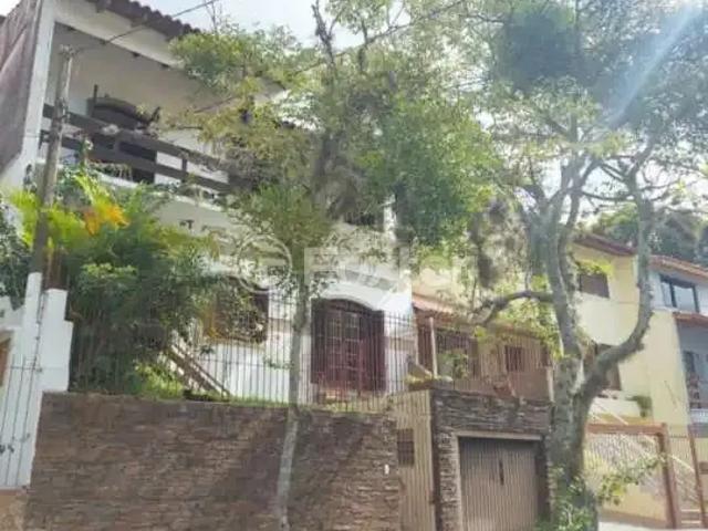 Casa / Sobrado para Venda em Porto Alegre/RS Partenon 4 Quartos