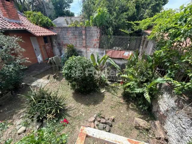 Casa / Sobrado para Venda em Porto Alegre/RS Partenon 4 Quartos