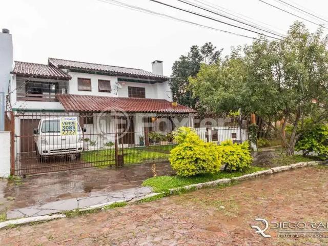Casa / Sobrado para Venda em Porto Alegre/RS Partenon 4 Quartos