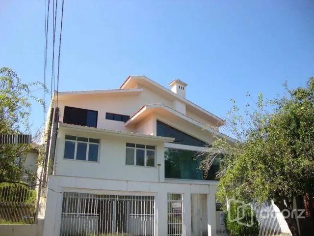 Casa / Sobrado para Venda em Porto Alegre/RS Partenon 4 Quartos