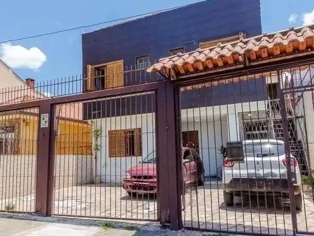 Casa / Sobrado para Venda em Porto Alegre/RS Partenon 4 Quartos
