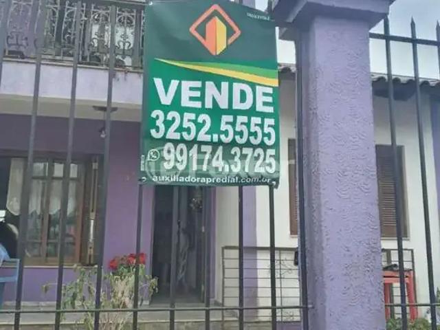 Casa / Sobrado para Venda em Porto Alegre/RS Partenon 4 Quartos