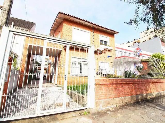 Casa / Sobrado para Venda em Porto Alegre/RS Partenon 4 Quartos