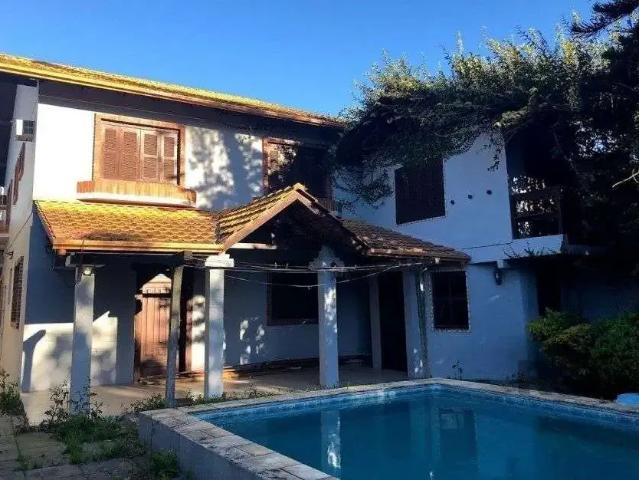 Casa / Sobrado para Venda em Porto Alegre/RS Partenon 4 Quartos