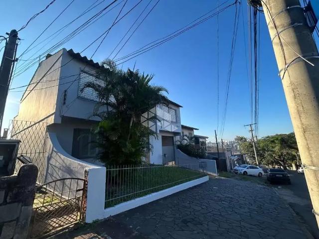 Casa / Sobrado para Venda em Porto Alegre/RS Partenon 4 Quartos