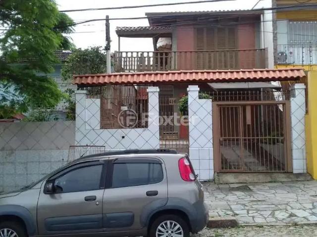 Casa / Sobrado para Venda em Porto Alegre/RS Partenon 4 Quartos