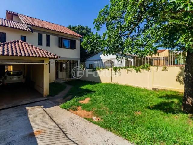 Casa / Sobrado para Venda em Porto Alegre/RS Partenon 4 Quartos