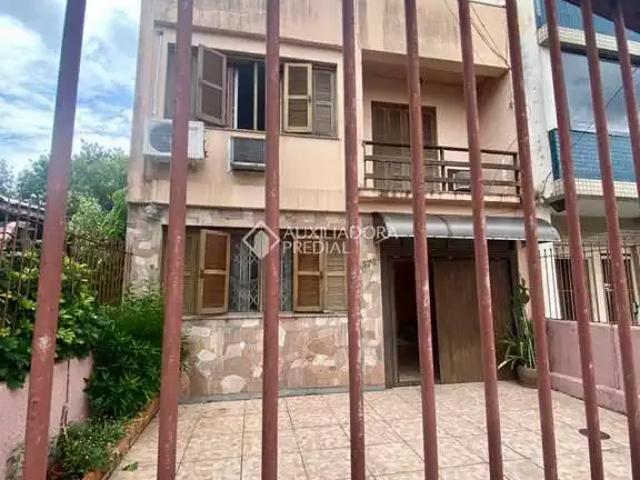 Casa / Sobrado para Venda em Porto Alegre/RS Partenon 4 Quartos