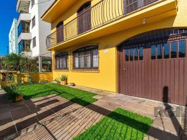Casa / Sobrado para Venda em Porto Alegre/RS Partenon 4 Quartos