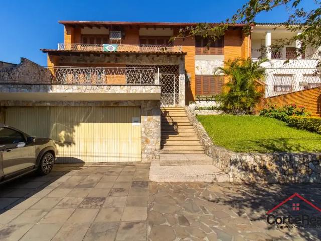 Casa / Sobrado para Venda em Porto Alegre/RS Partenon 5 Quartos