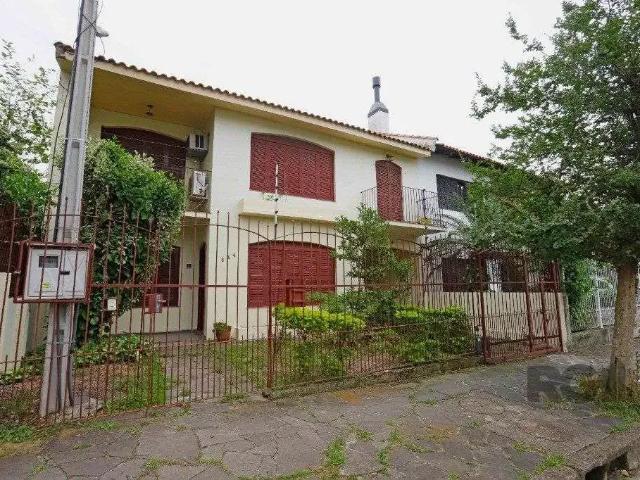 Casa / Sobrado para Venda em Porto Alegre/RS Partenon 5 Quartos