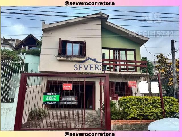Casa / Sobrado para Venda em Porto Alegre/RS Partenon 5 Quartos