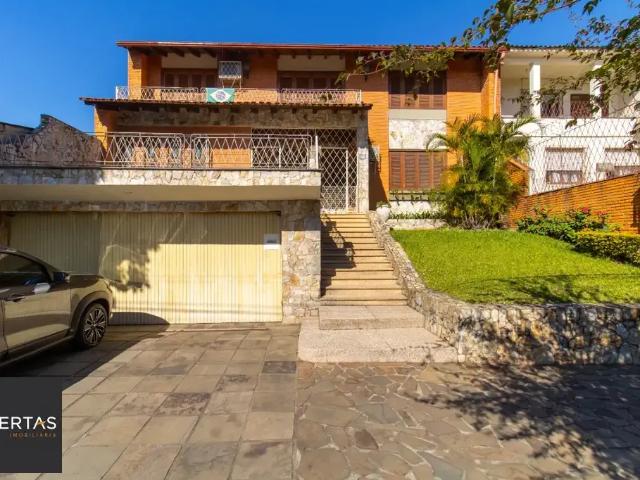Casa / Sobrado para Venda em Porto Alegre/RS Partenon 5 Quartos