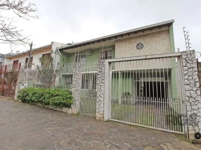Casa / Sobrado para Venda em Porto Alegre/RS Partenon 5 Quartos