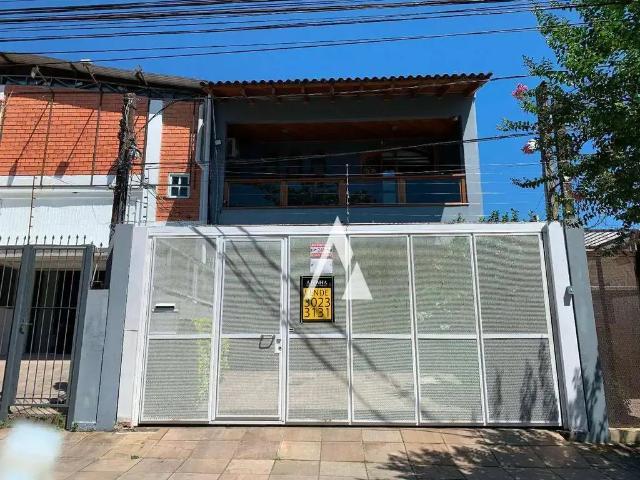 Casa / Sobrado para Venda em Porto Alegre/RS Partenon 5 Quartos