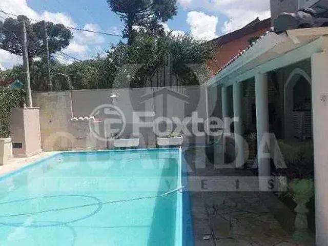 Casa / Sobrado para Venda em Porto Alegre/RS Partenon 5 Quartos