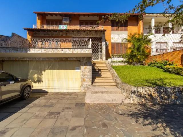 Casa / Sobrado para Venda em Porto Alegre/RS Partenon 5 Quartos