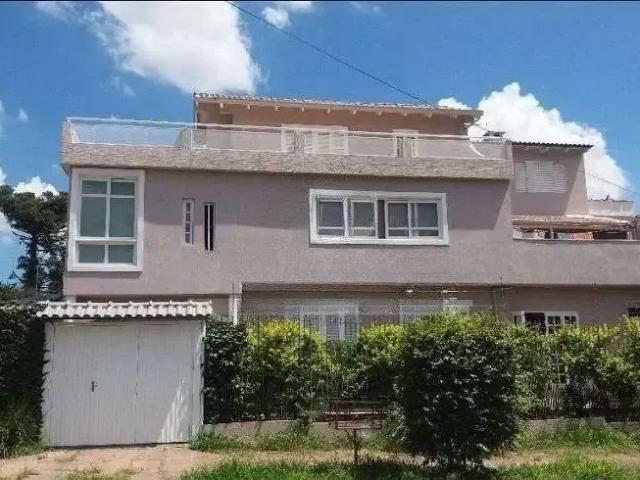 Casa / Sobrado para Venda em Porto Alegre/RS Partenon 5 Quartos