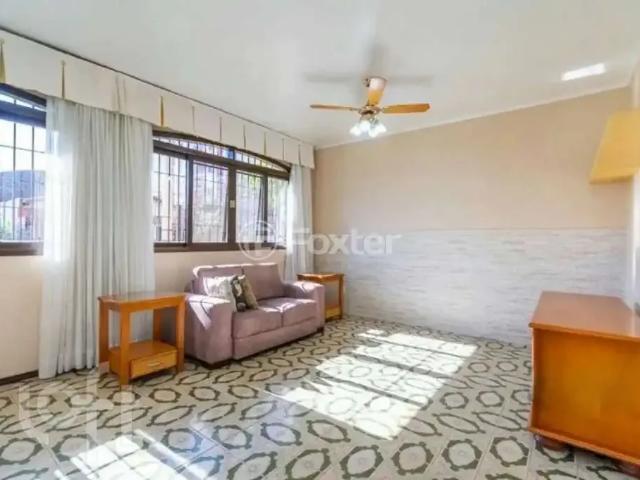 Casa / Sobrado para Venda em Porto Alegre/RS Partenon 5 Quartos
