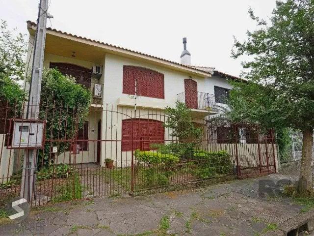 Casa / Sobrado para Venda em Porto Alegre/RS Partenon 5 Quartos