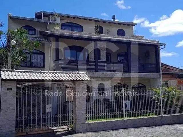 Casa / Sobrado para Venda em Porto Alegre/RS Partenon 6 Quartos