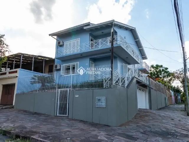 Casa / Sobrado para Venda em Porto Alegre/RS Partenon 3 Quartos
