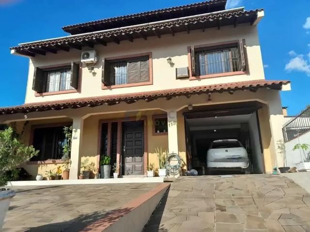 Casa / Sobrado para Venda em Porto Alegre/RS Partenon 3 Quartos