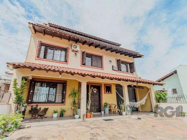 Casa / Sobrado para Venda em Porto Alegre/RS Partenon 3 Quartos