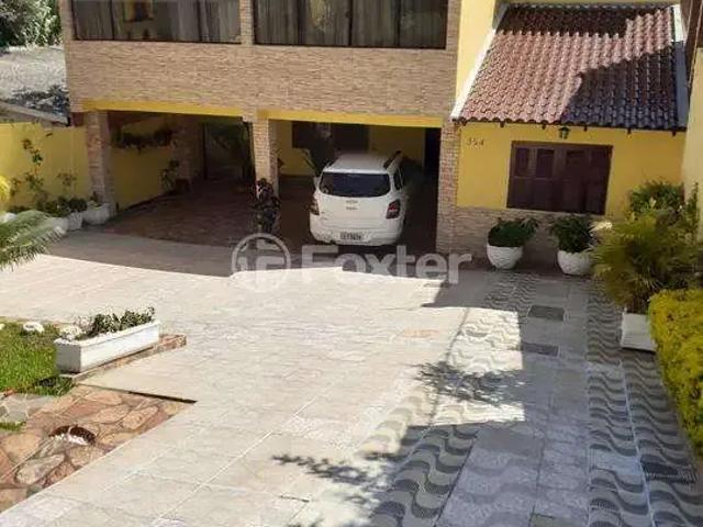 Casa / Sobrado para Venda em Porto Alegre/RS Partenon 3 Quartos