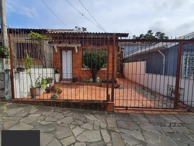 Casa / Sobrado para Venda em Porto Alegre/RS Partenon 3 Quartos