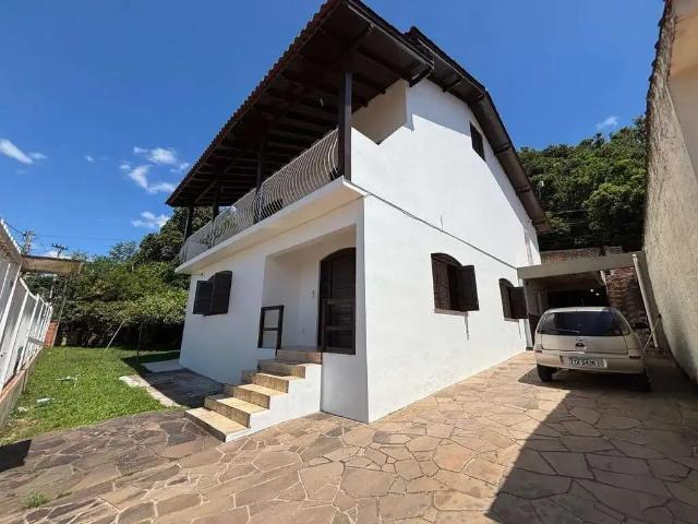 Casa / Sobrado para Venda em Porto Alegre/RS Partenon 3 Quartos