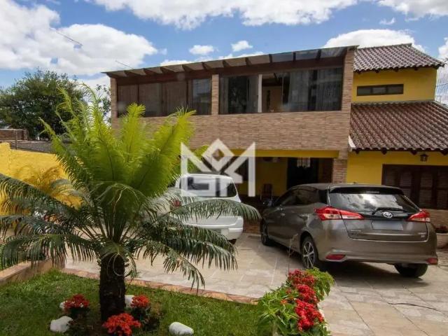Casa / Sobrado para Venda em Porto Alegre/RS Partenon 3 Quartos