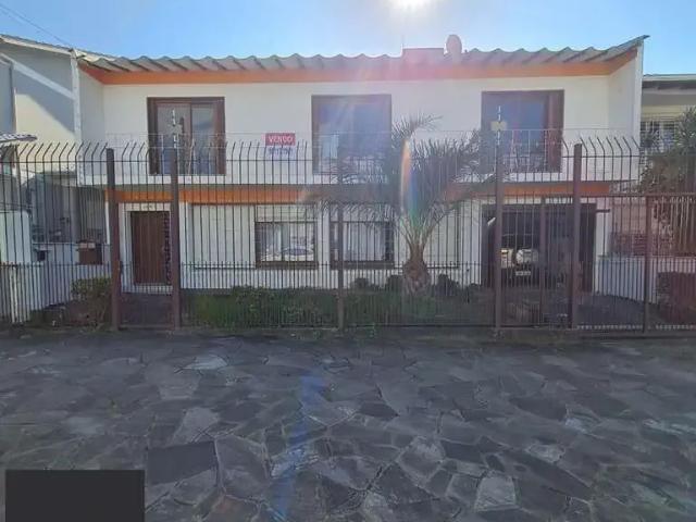Casa / Sobrado para Venda em Porto Alegre/RS Partenon 3 Quartos