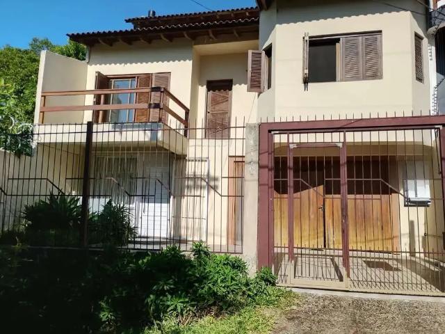Casa / Sobrado para Venda em Porto Alegre/RS Parque Santa Fé 3 Quartos