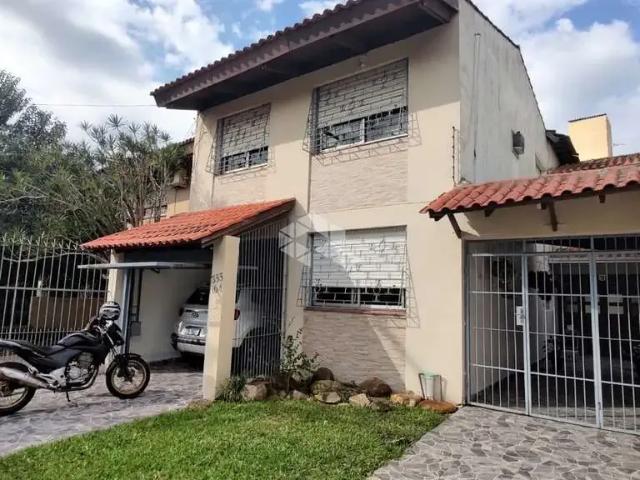 Casa / Sobrado para Venda em Porto Alegre/RS Parque Santa Fé 4 Quartos