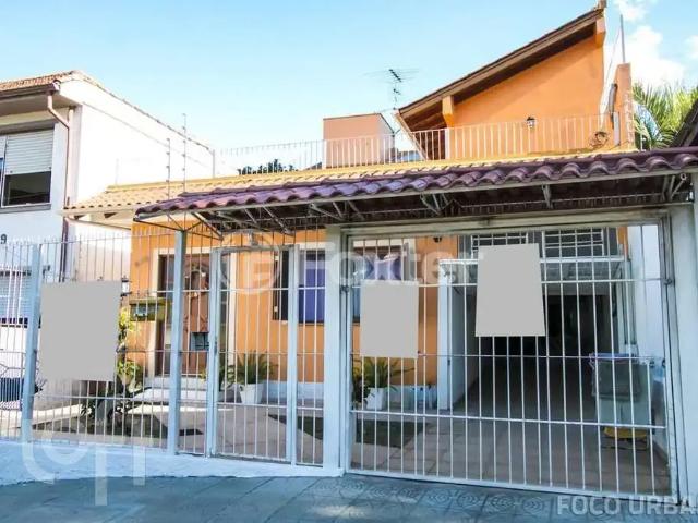 Casa / Sobrado para Venda em Porto Alegre/RS Passo da Areia 4 Quartos
