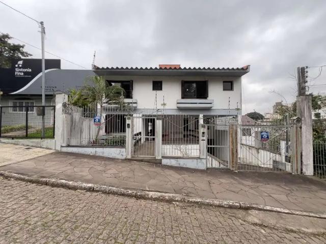 Casa / Sobrado para Venda em Porto Alegre/RS Passo da Areia 4 Quartos