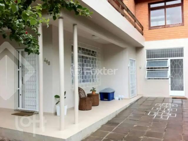 Casa / Sobrado para Venda em Porto Alegre/RS Passo da Areia 4 Quartos