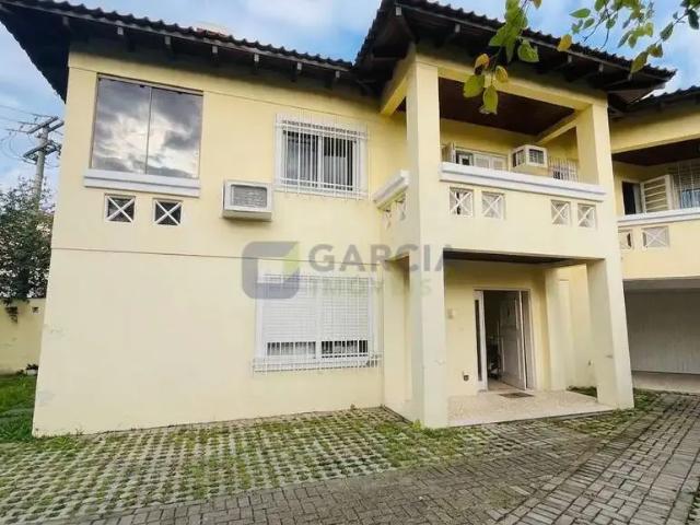 Casa / Sobrado para Venda em Porto Alegre/RS Passo da Areia 5 Quartos