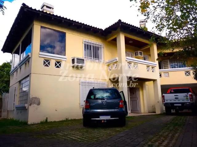 Casa / Sobrado para Venda em Porto Alegre/RS Passo da Areia 5 Quartos