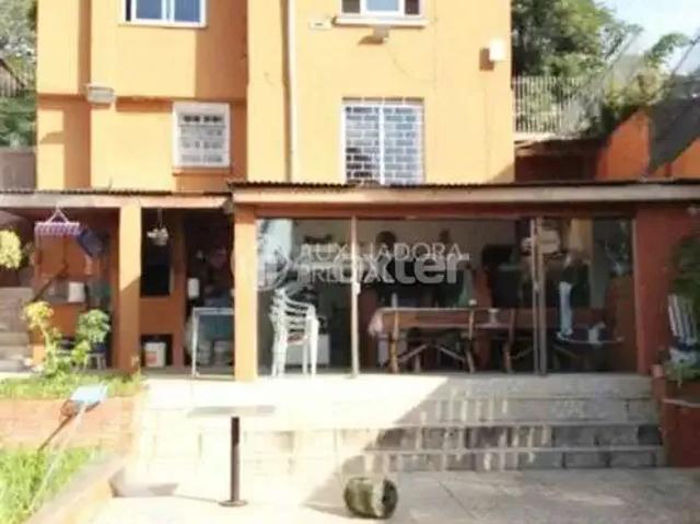 Casa / Sobrado para Venda em Porto Alegre/RS Passo da Areia 3 Quartos