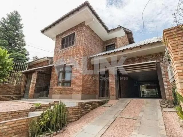 Casa / Sobrado para Venda em Porto Alegre/RS Passo da Areia 3 Quartos