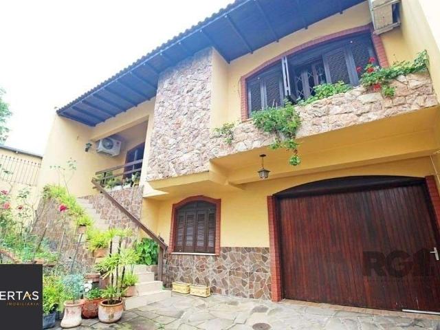 Casa / Sobrado para Venda em Porto Alegre/RS Passo da Areia 3 Quartos