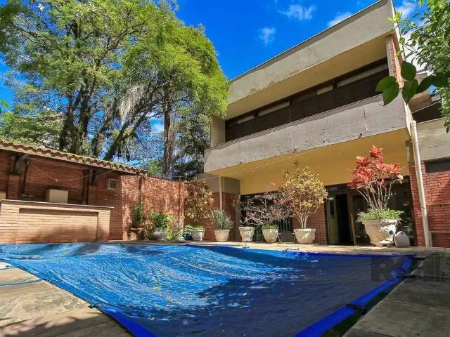 Casa / Sobrado para Venda em Porto Alegre/RS Petrópolis 4 Quartos