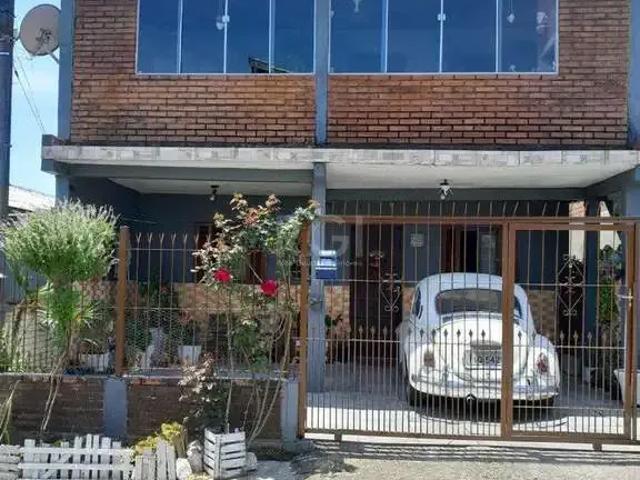 Casa / Sobrado para Venda em Porto Alegre/RS Restinga 4 Quartos