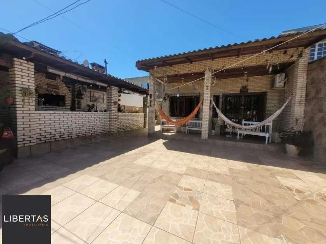 Casa / Sobrado para Venda em Porto Alegre/RS Restinga 4 Quartos