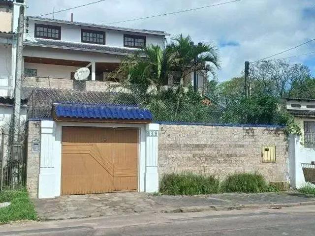 Casa / Sobrado para Venda em Porto Alegre/RS Restinga 4 Quartos