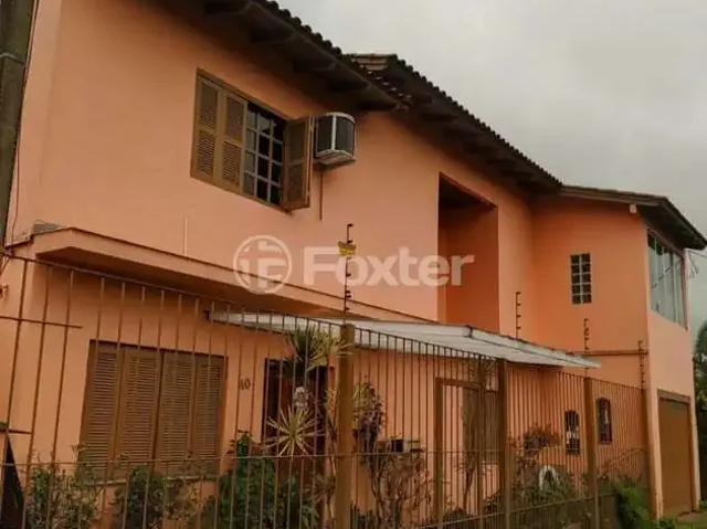 Casa / Sobrado para Venda em Porto Alegre/RS Restinga 4 Quartos
