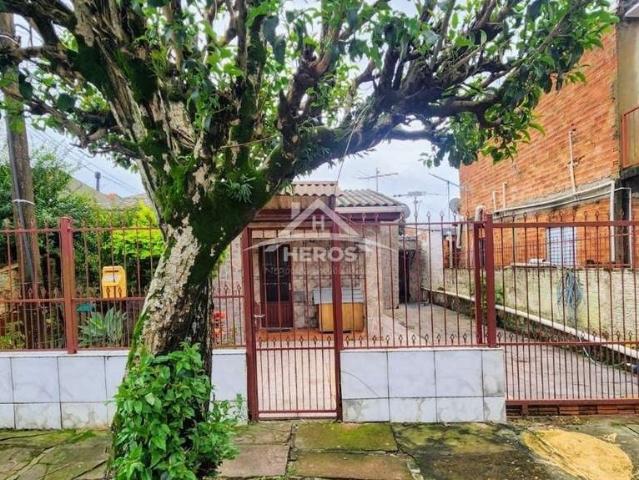 Casa / Sobrado para Venda em Porto Alegre/RS Restinga 3 Quartos